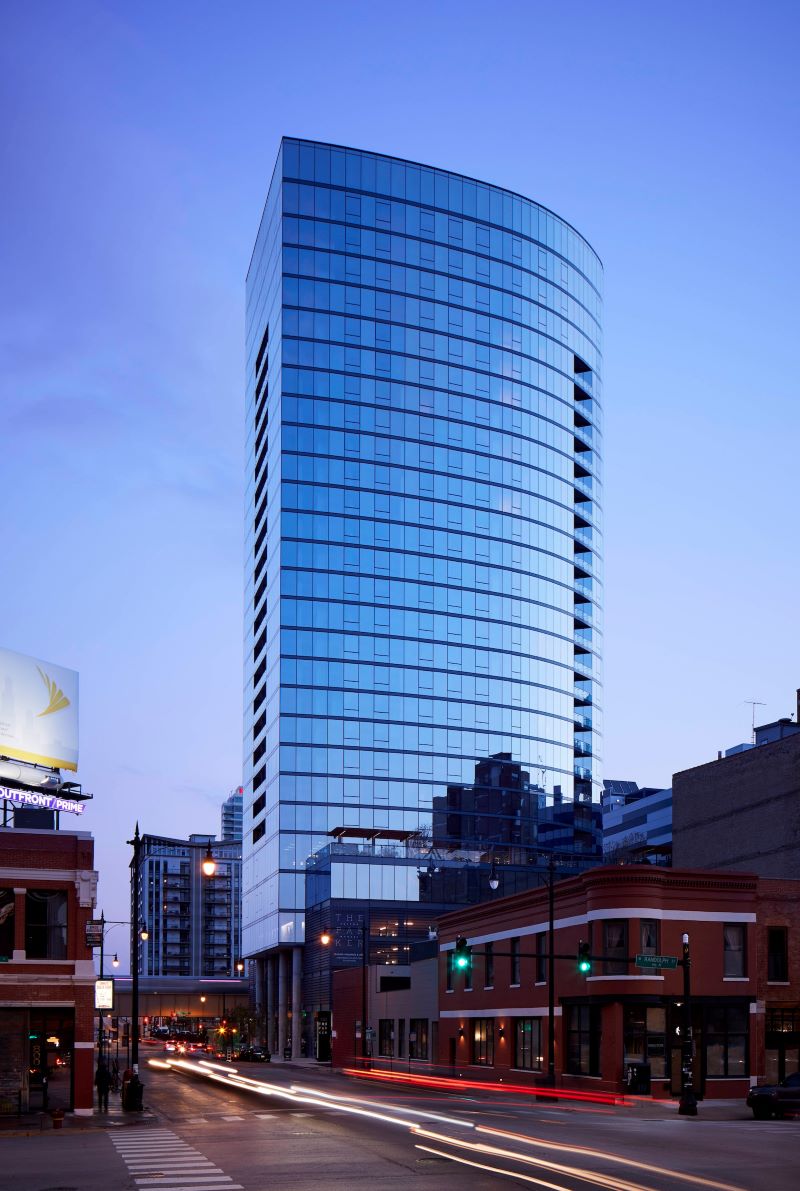 JLL Capital Markets brokers sale of 227-unit luxury apartment building ...